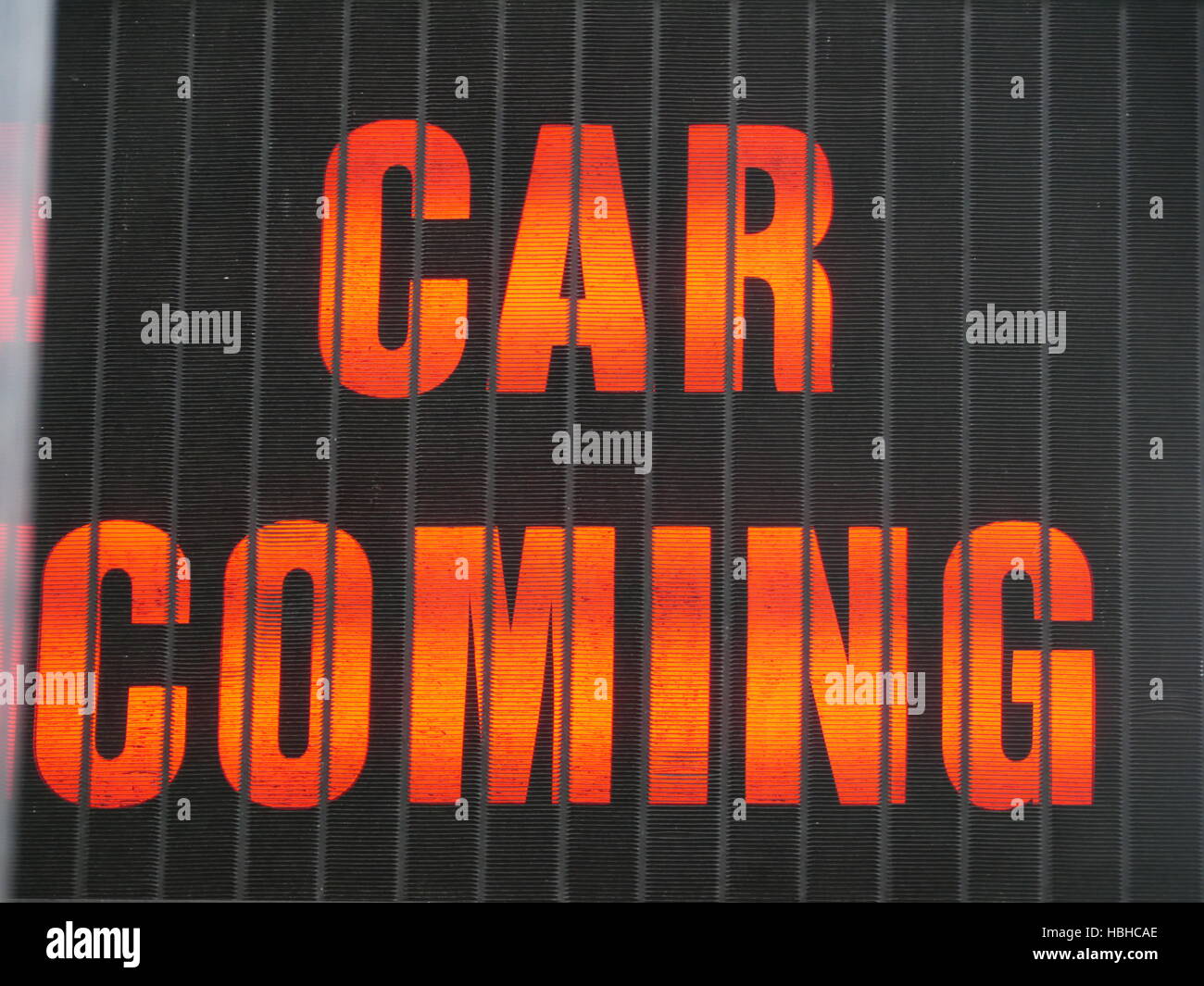 Traffic sign with text car coming Stock Photo - Alamy