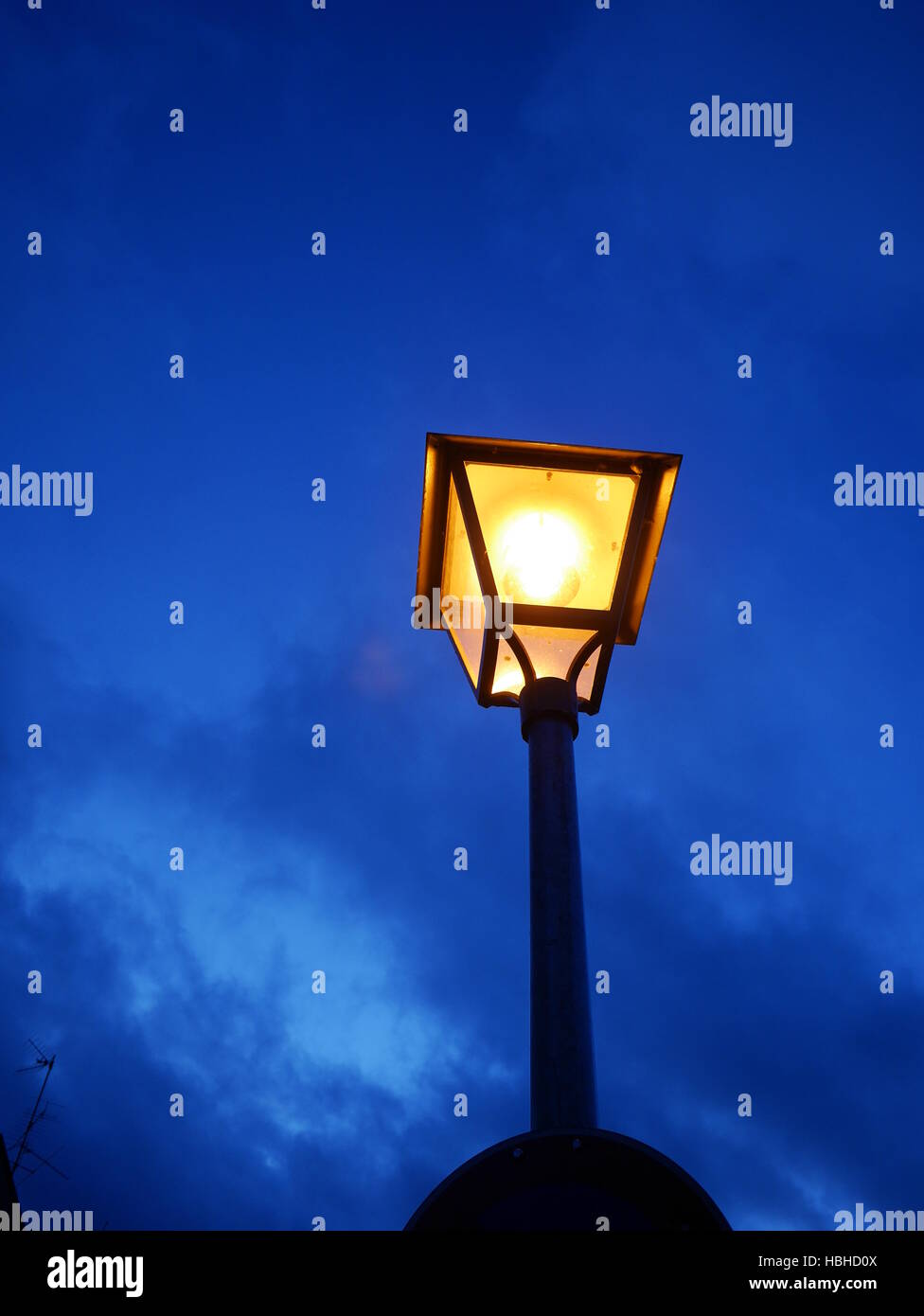Old street lamp in the evening Stock Photo - Alamy