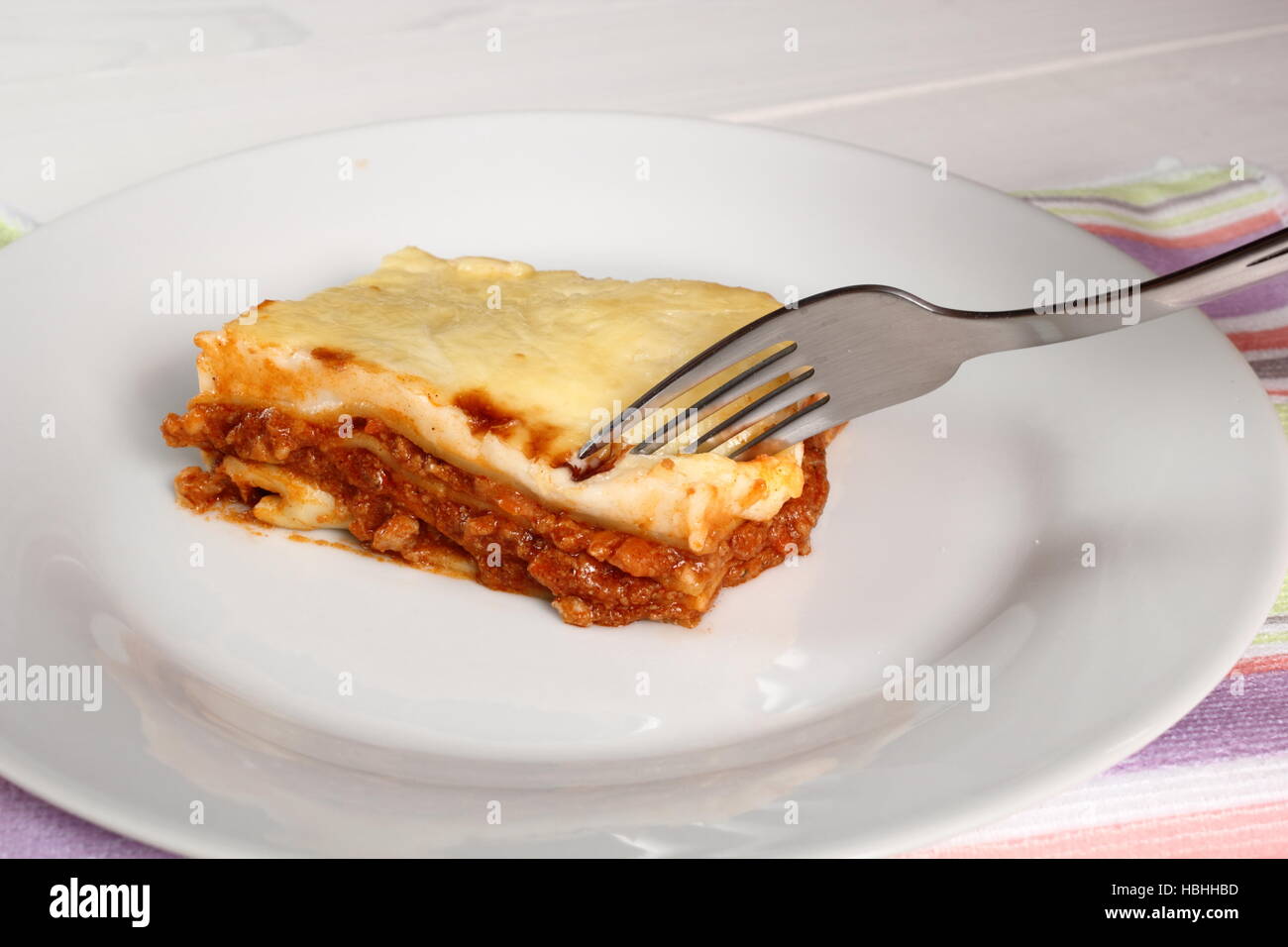 Eating Lasagne Bolognese Stock Photo - Alamy