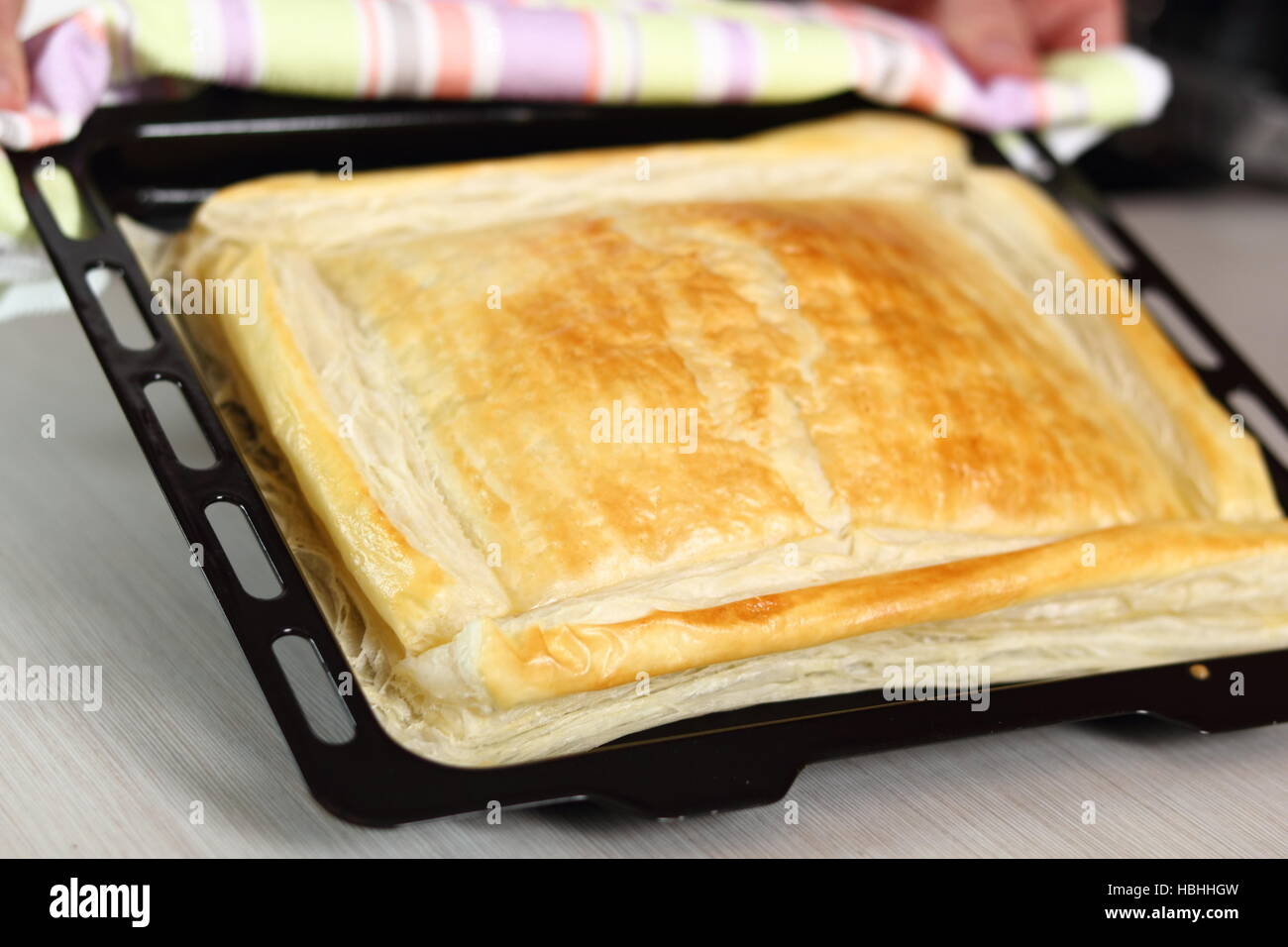 Baked puff pastry base. Making Chicken and Egg Galette Series Stock ...