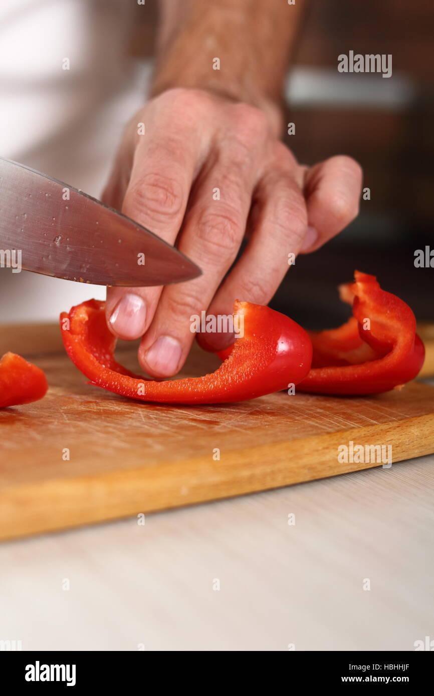 Chef slicing red bell pepper. Making Chicken and Egg Galette Series ...