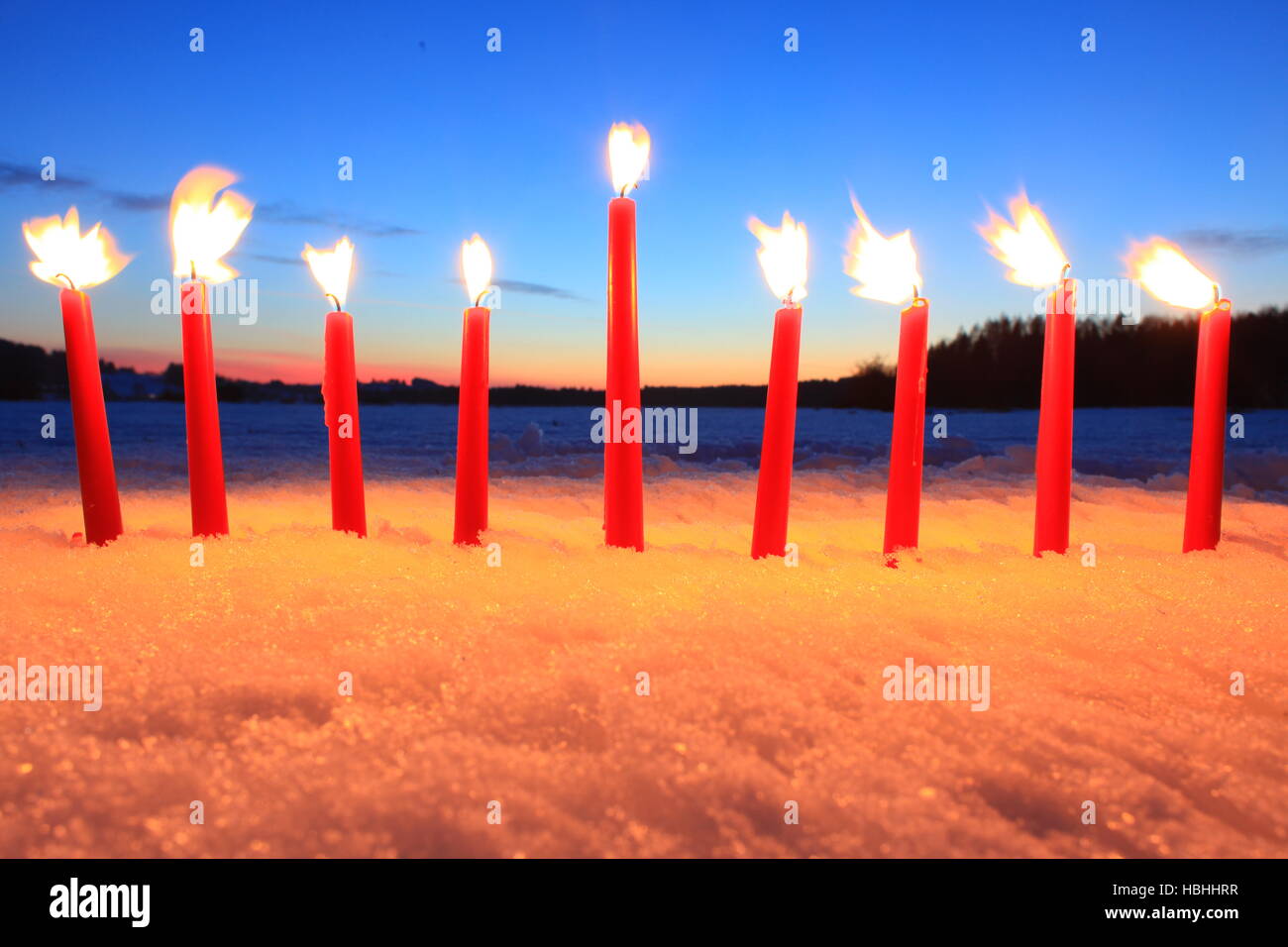 candles in the snow outdoors Stock Photo - Alamy