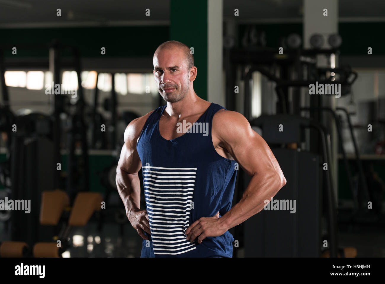 Portrait Of A Physically Fit Man Showing His Well Trained Body ...