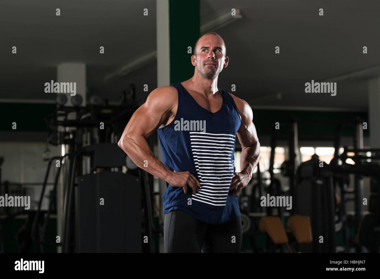 Portrait Of A Physically Fit Man Showing His Well Trained Body ...