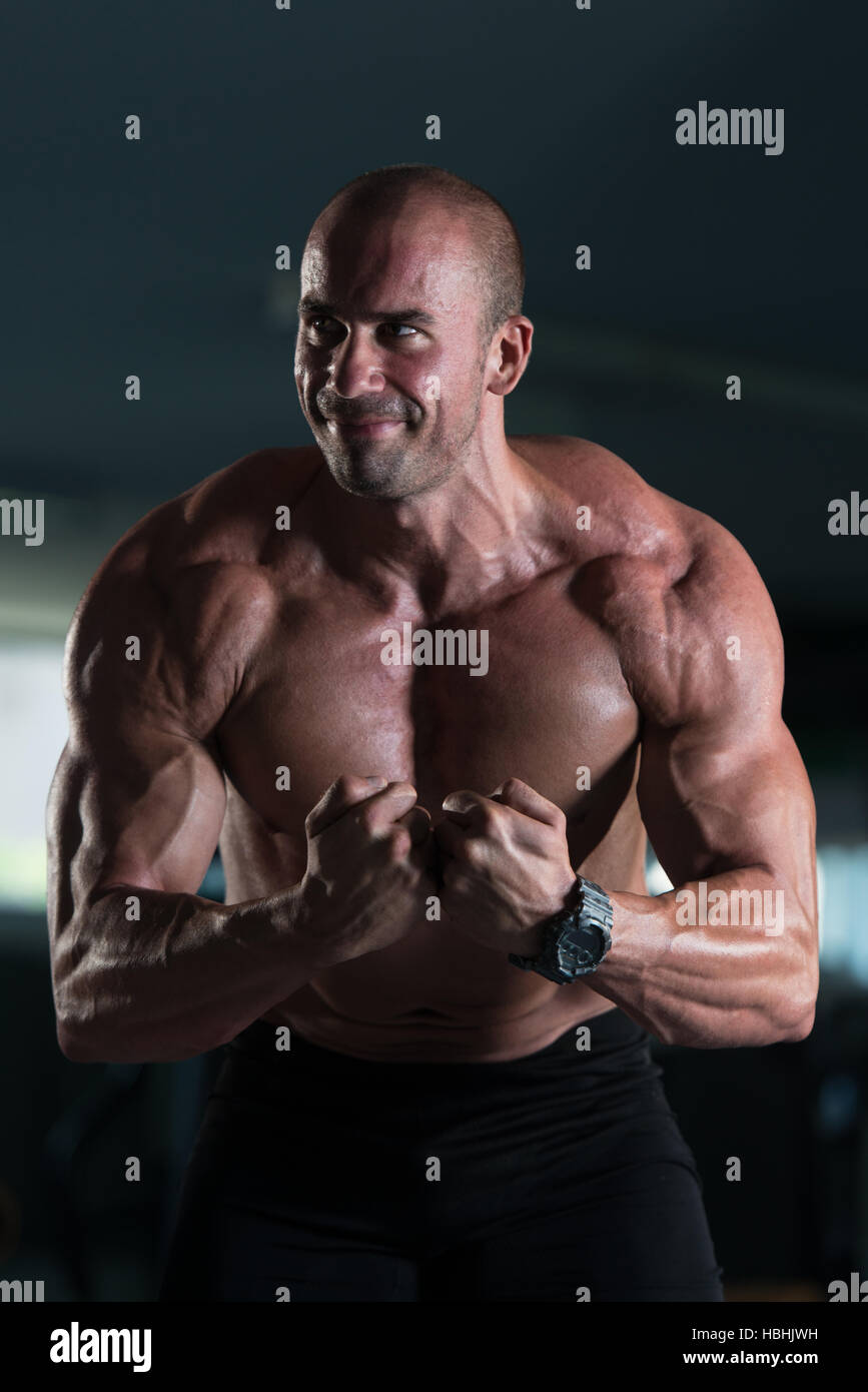 Portrait Of A Young Physically Fit Man Showing His Well Trained Body ...