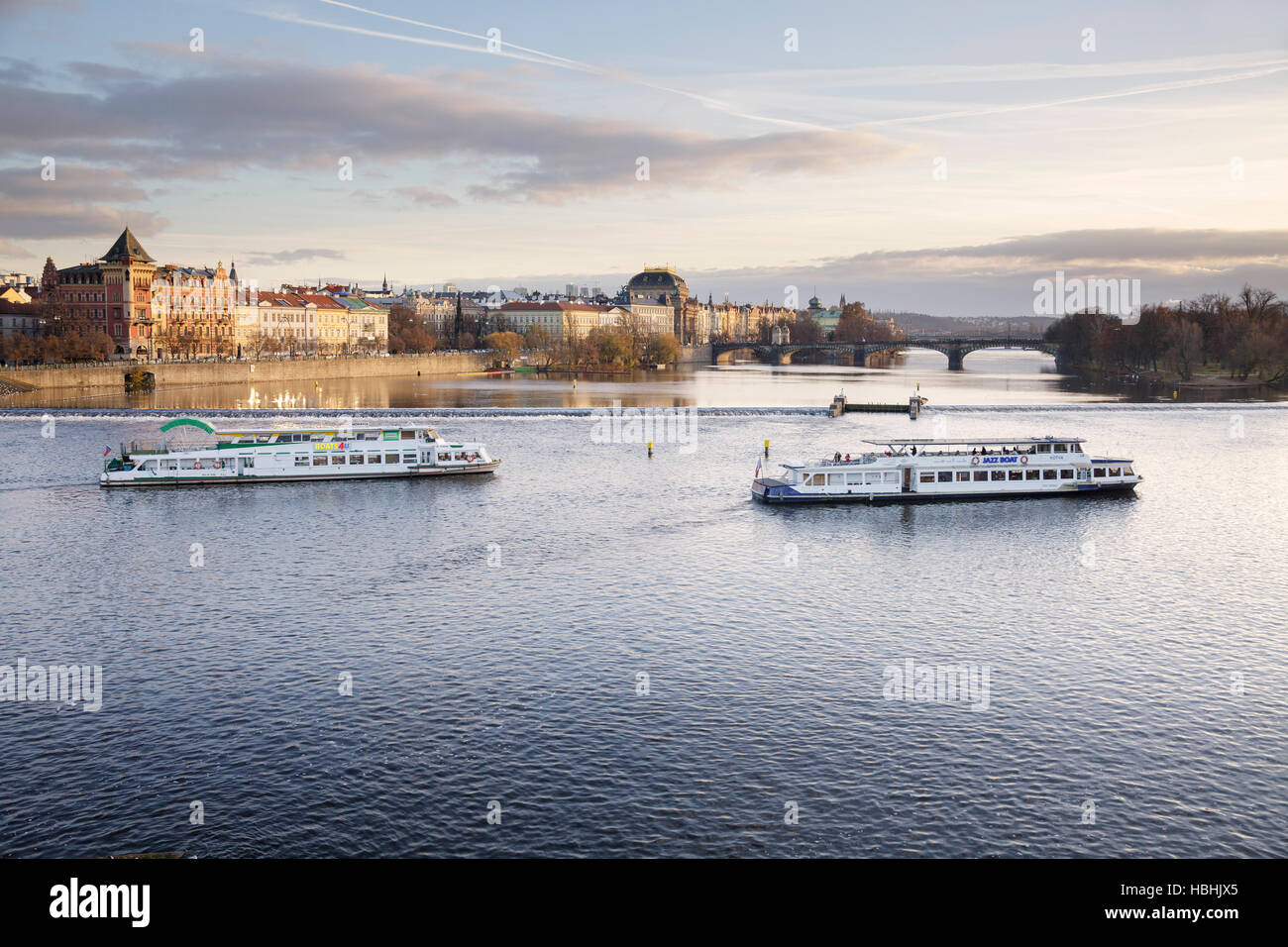 view of the Vlatva River from the Charles Bridge with tourist boats, Prague, Czech Republic ...