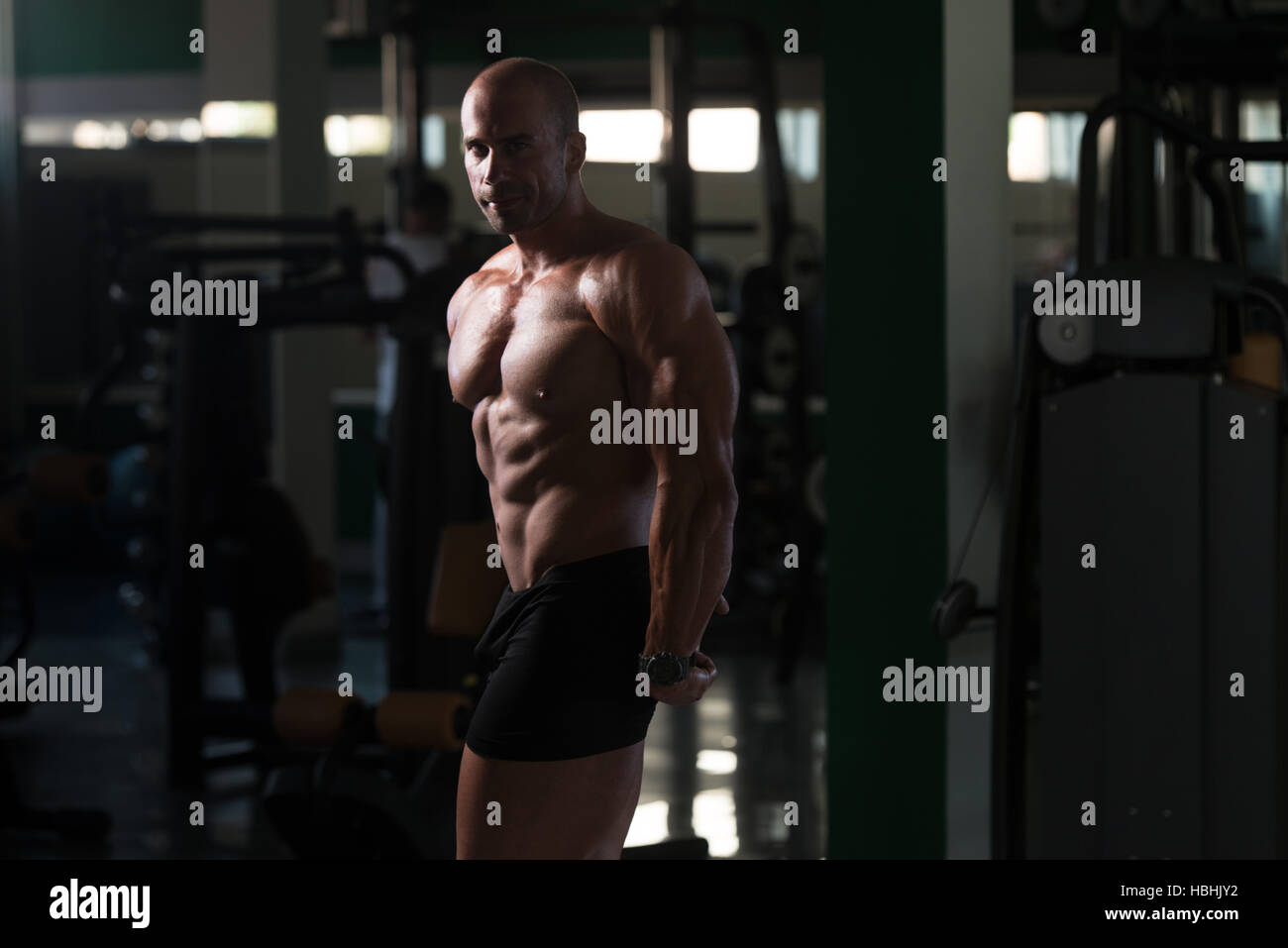 Portrait Of A Young Physically Fit Man Showing His Well Trained Body ...