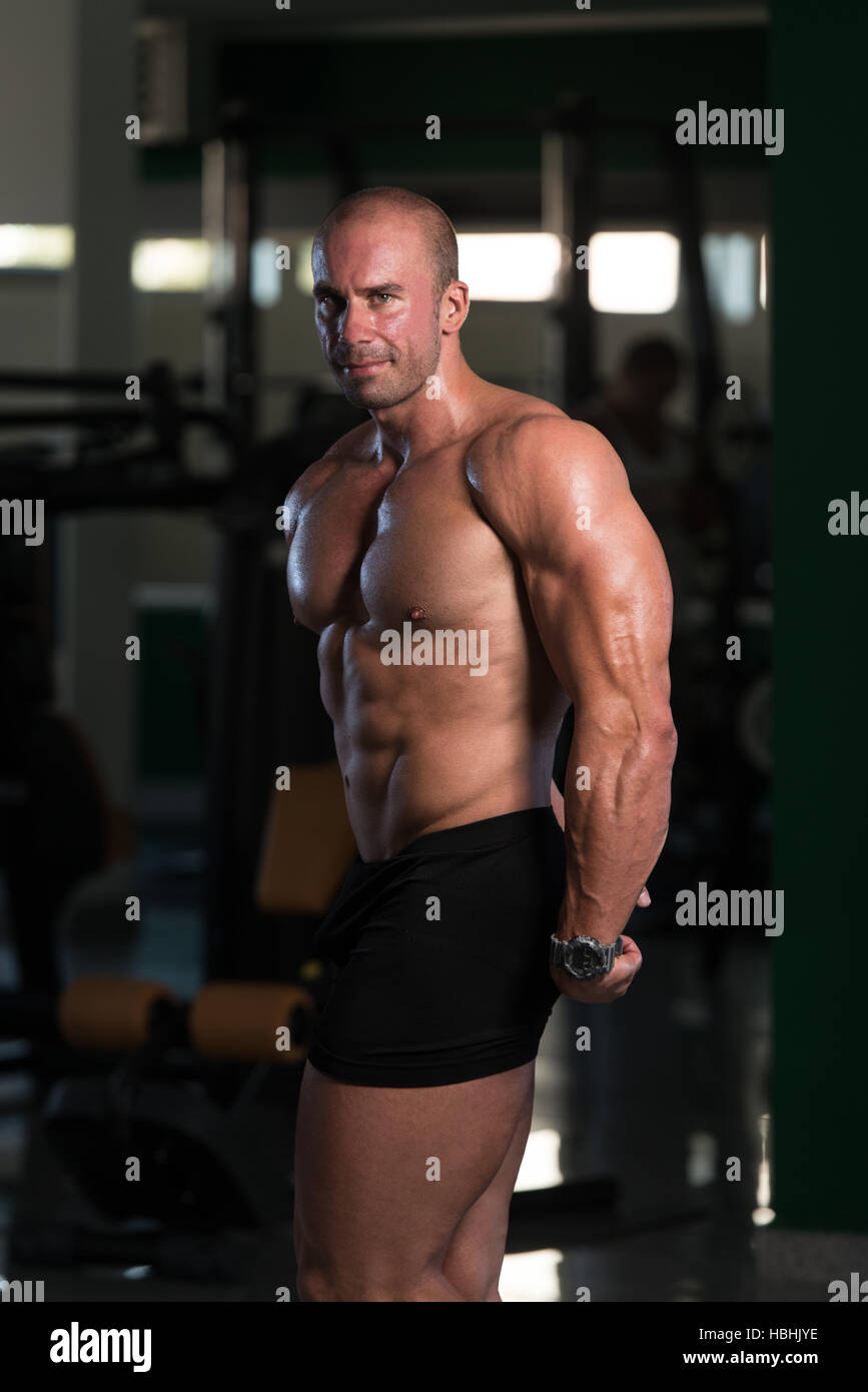 Portrait Of A Young Physically Fit Man Showing His Well Trained Body ...