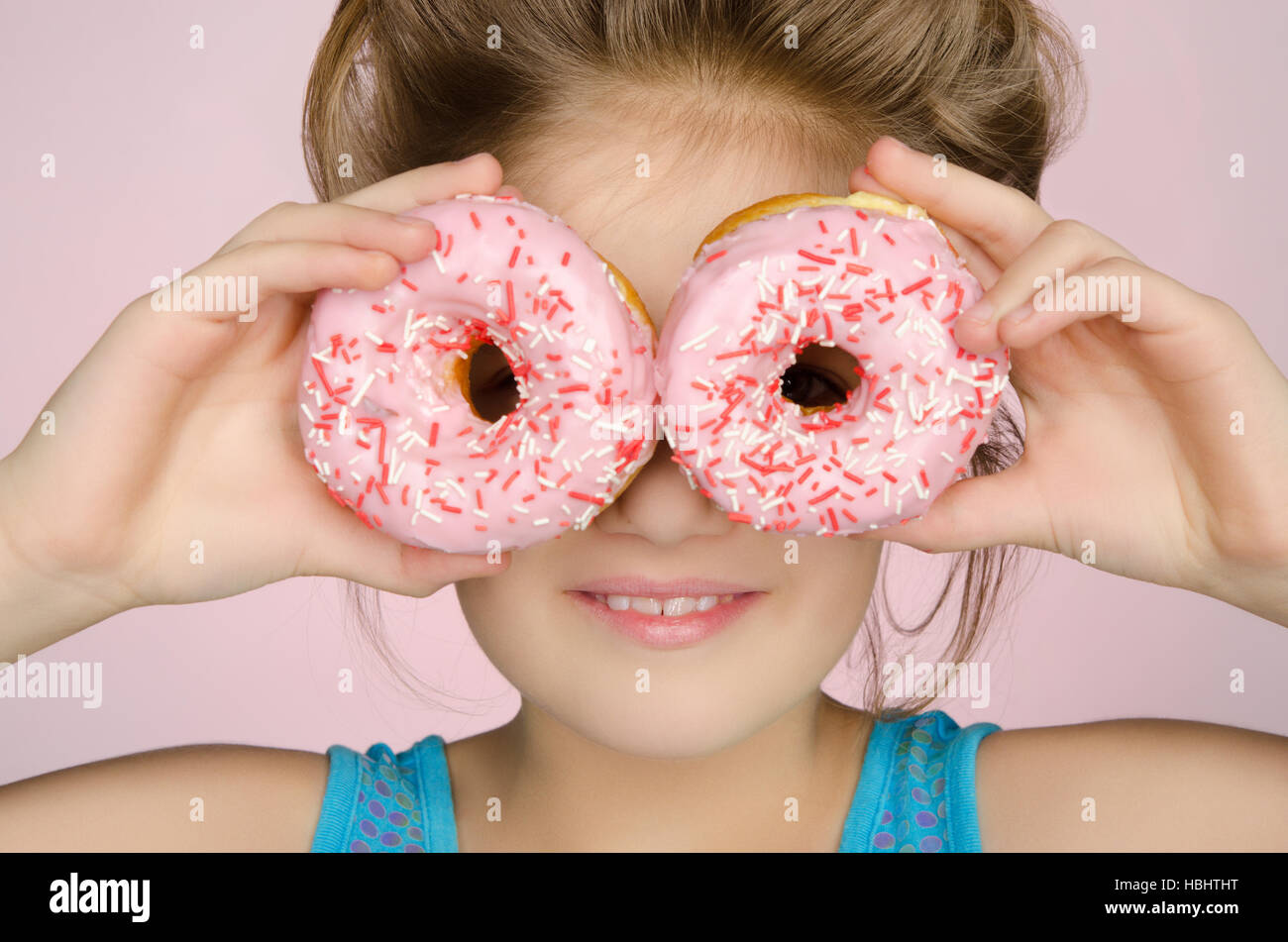 Coloured donuts hi-res stock photography and images - Alamy
