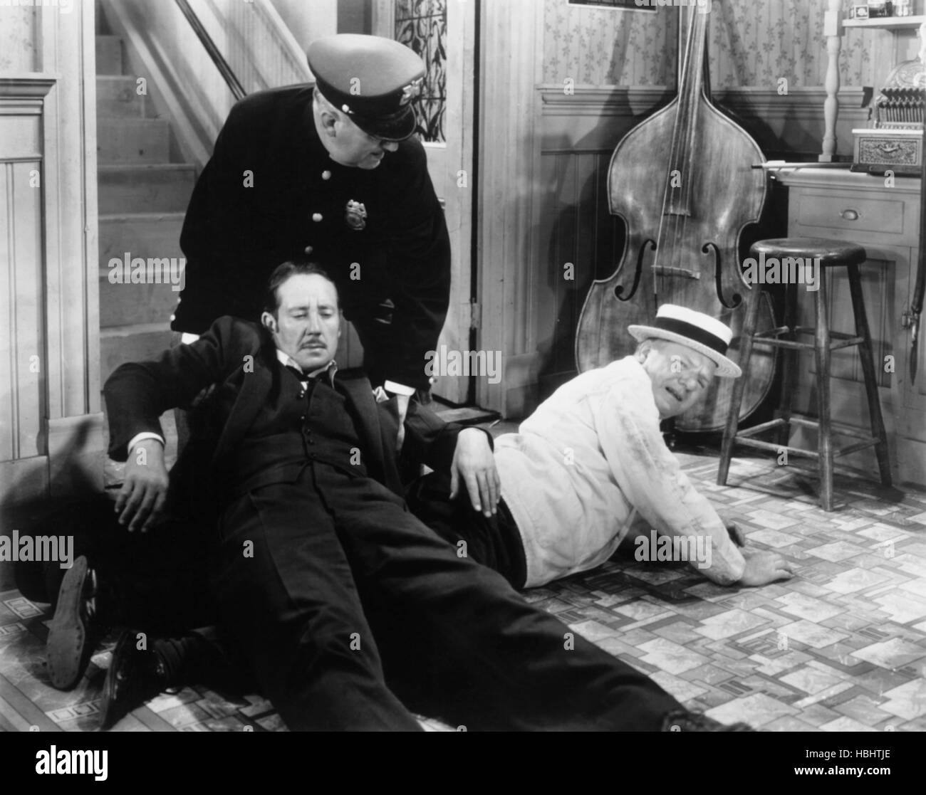 THE BARBER SHOP, from left, Cyril Ring, Dick Rush, (policeman), W.C ...