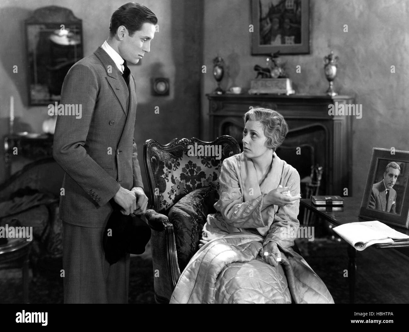 BACK STREET, William Bakewell, Irene Dunne, John Boles [in photograph ...
