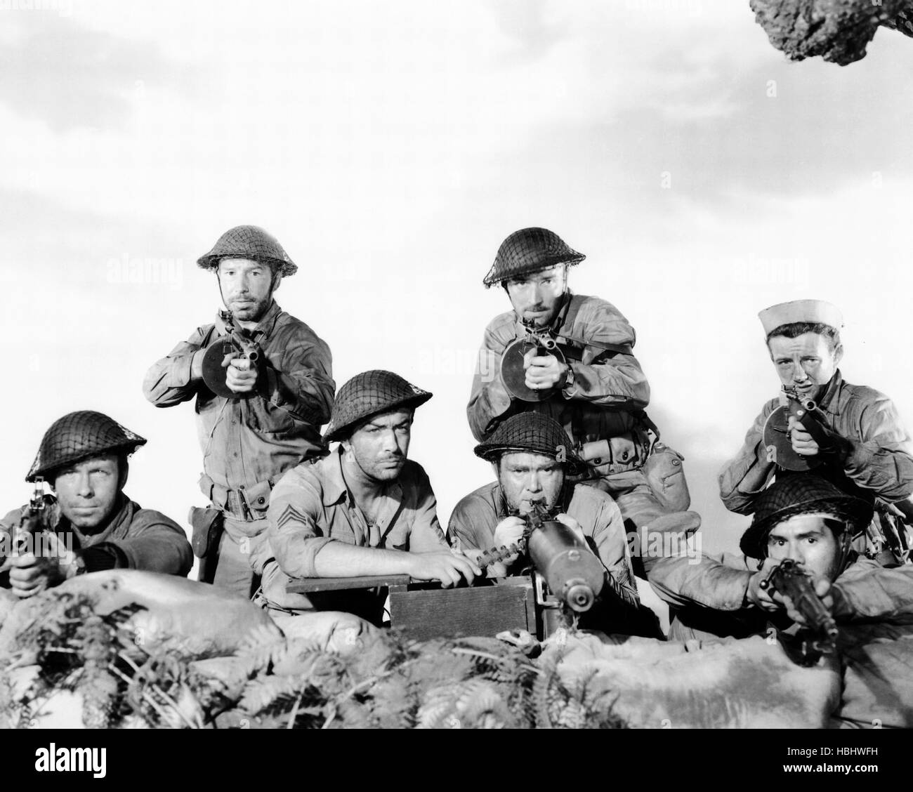 BATAAN, from left, front, Phillip Terry, Robert Taylor, Thomas Mitchell ...