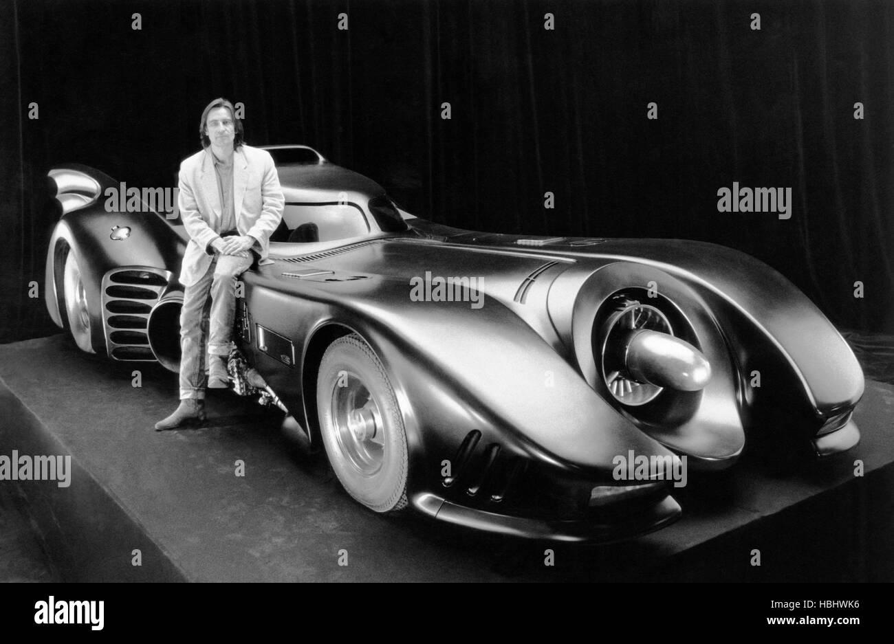 BATMAN, production designer Anton Furst with his Batmobile, 1989 ...