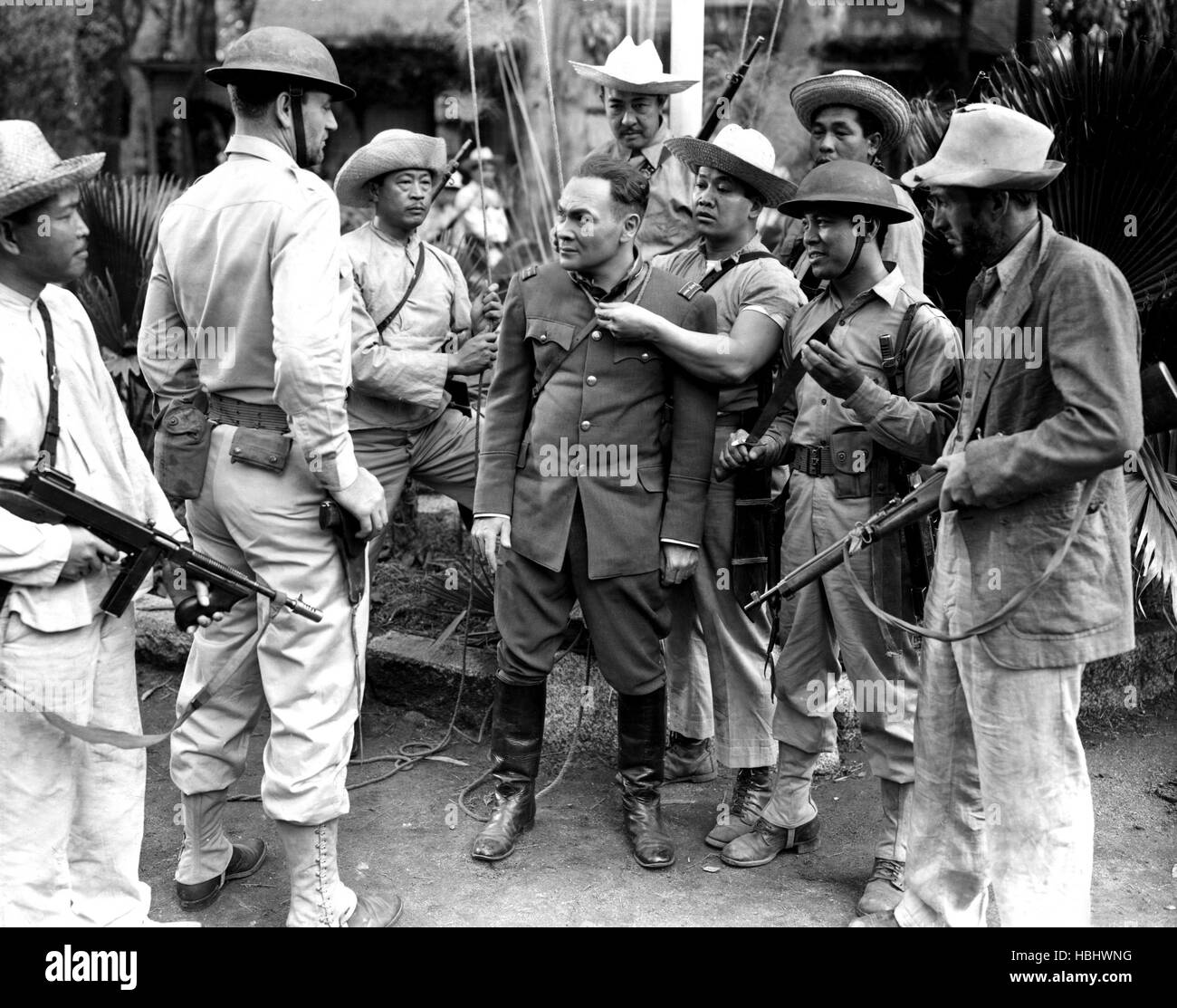 BACK TO BATAAN, John Wayne, Abner Biberman, Paul Fix, 1945 Stock Photo ...