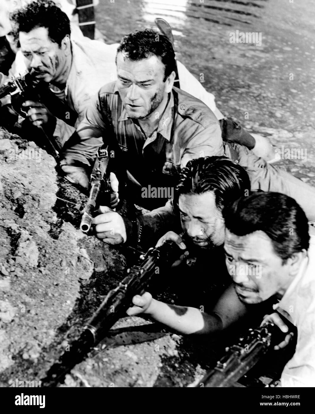 BACK TO BATAAN, John Wayne (second from left), 1945 Stock Photo - Alamy
