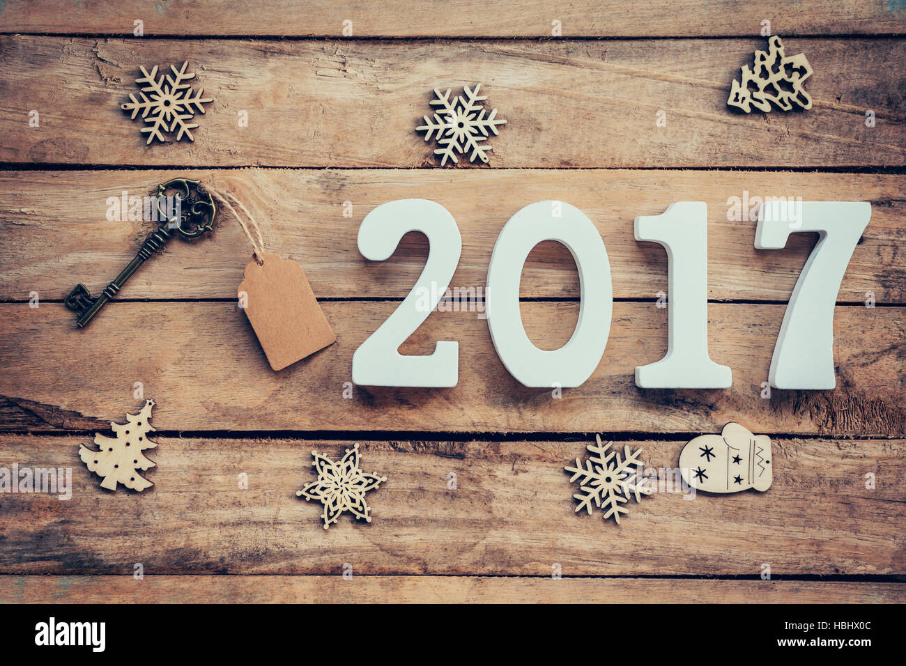 Old key with tag and wooden numbers forming the number 2017, For the ...