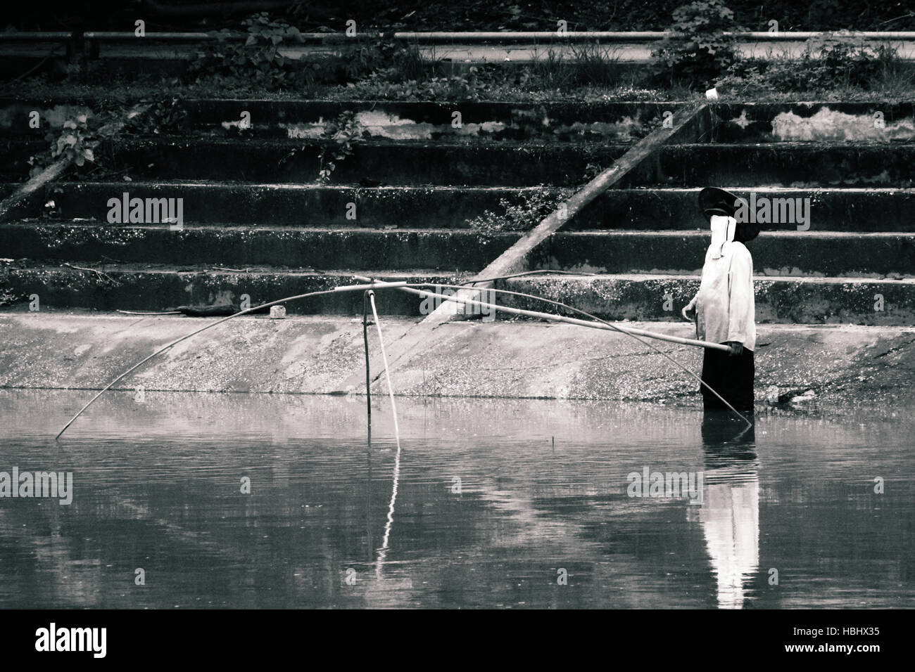 Lampang, Thailand - October 21: An unidentified fisherman catches fish ...