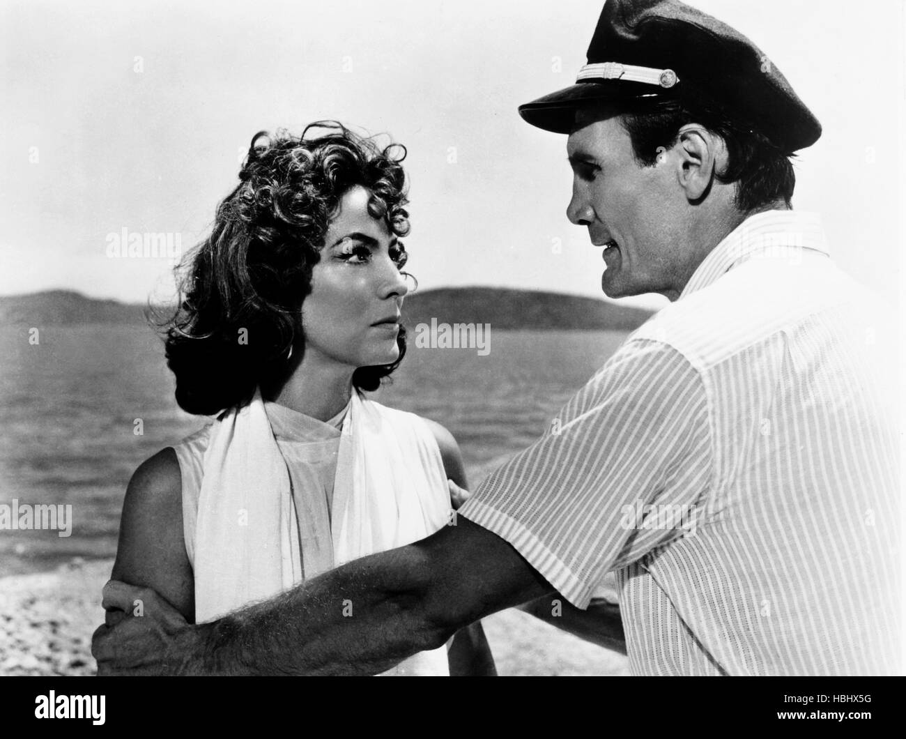 BEYOND ALL LIMITS, (aka FLOR DE MAYO), from left: Maria Felix, Jack Palance, 1959 Stock Photo ...