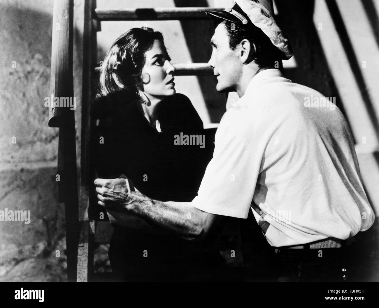 BEYOND ALL LIMITS, (aka FLOR DE MAYO), from left: Maria Felix, Jack Palance, 1959 Stock Photo ...