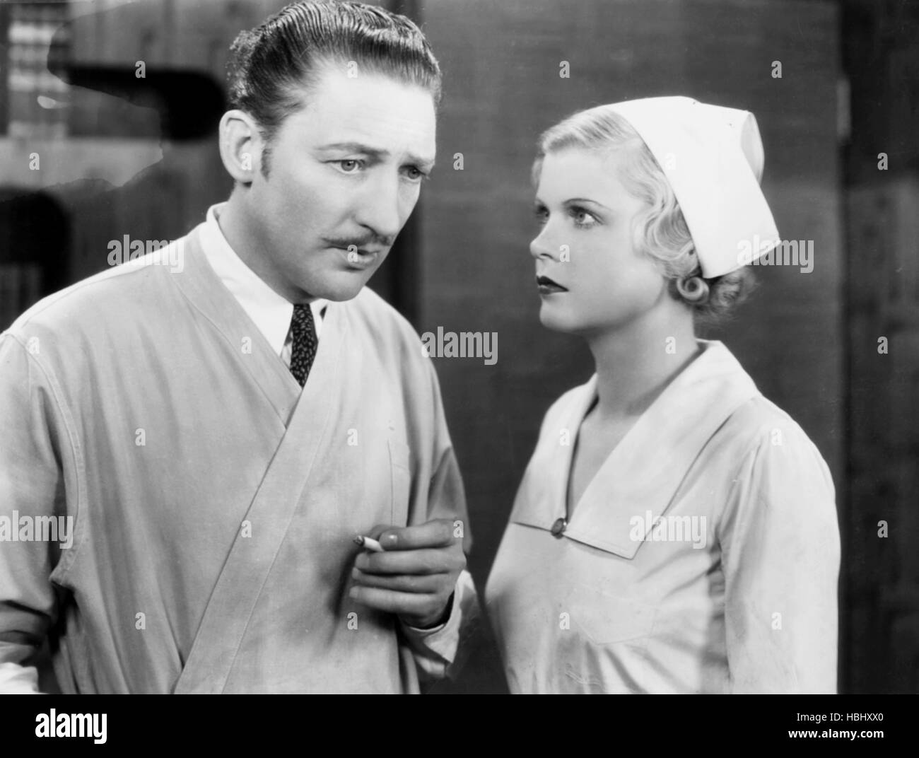 BEDSIDE, from left, Warren William, Jean Muir, 1934 Stock Photo - Alamy