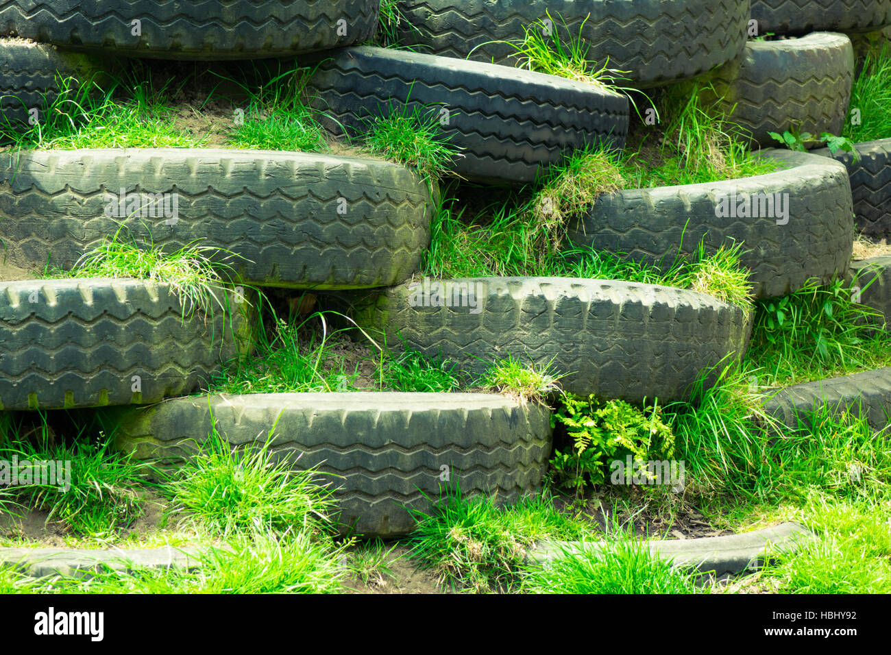 Climbing wall of tyres Stock Photo - Alamy