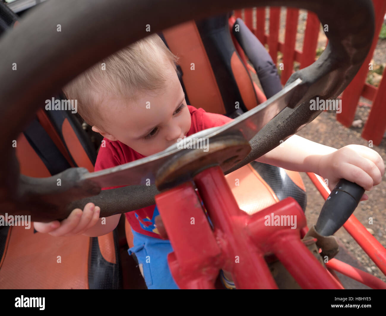 Little boy behind the wheel Stock Photo - Alamy