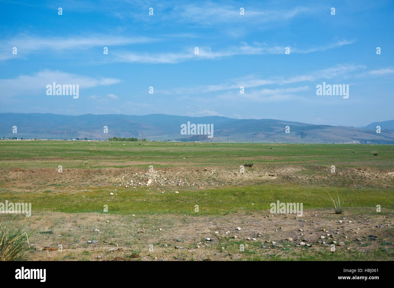 Steppe on a background of mountains Stock Photo - Alamy
