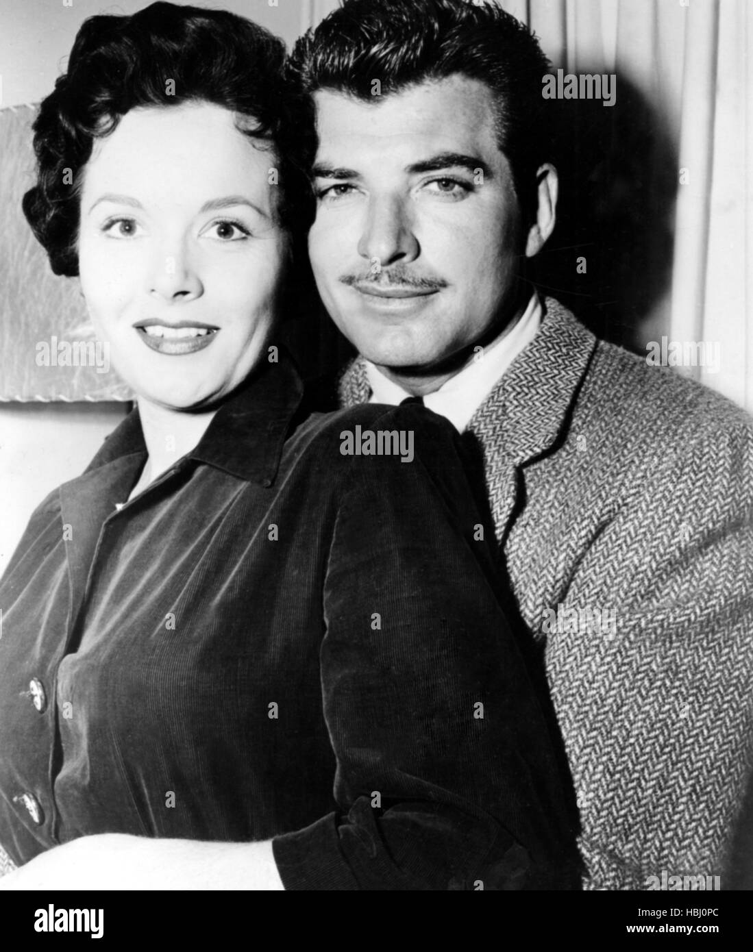 THE BIG BLUFF, from left: Eve Miller, John Bromfield, 1955 Stock Photo ...