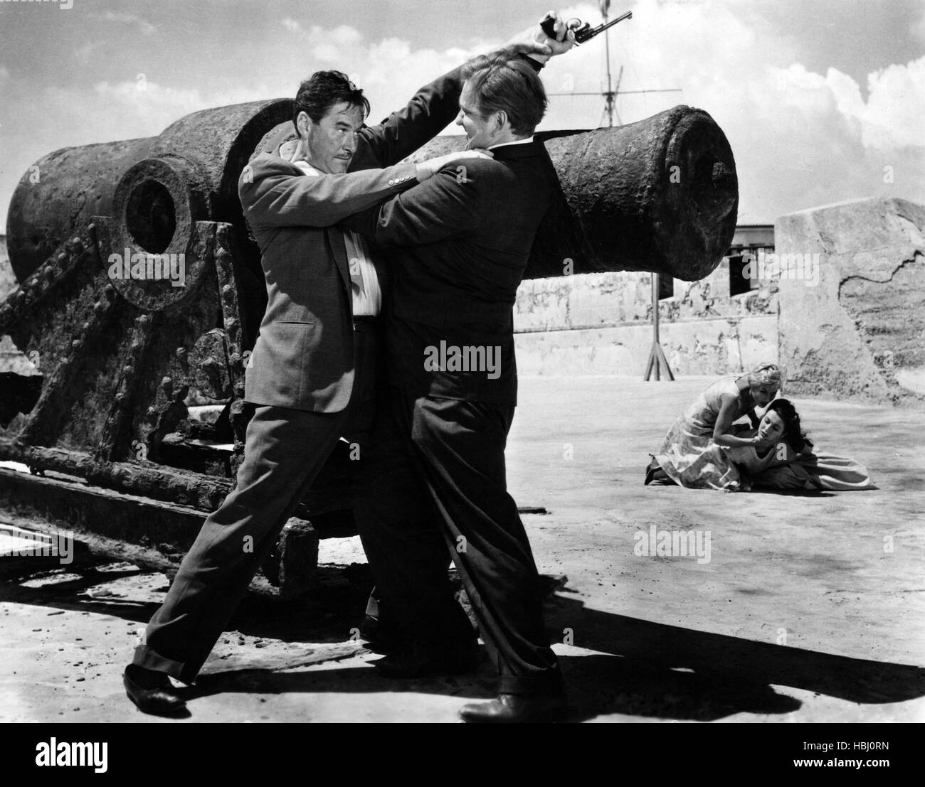 THE BIG BOODLE, Gia Scala (background), Errol Flynn (l), 1957 Stock ...