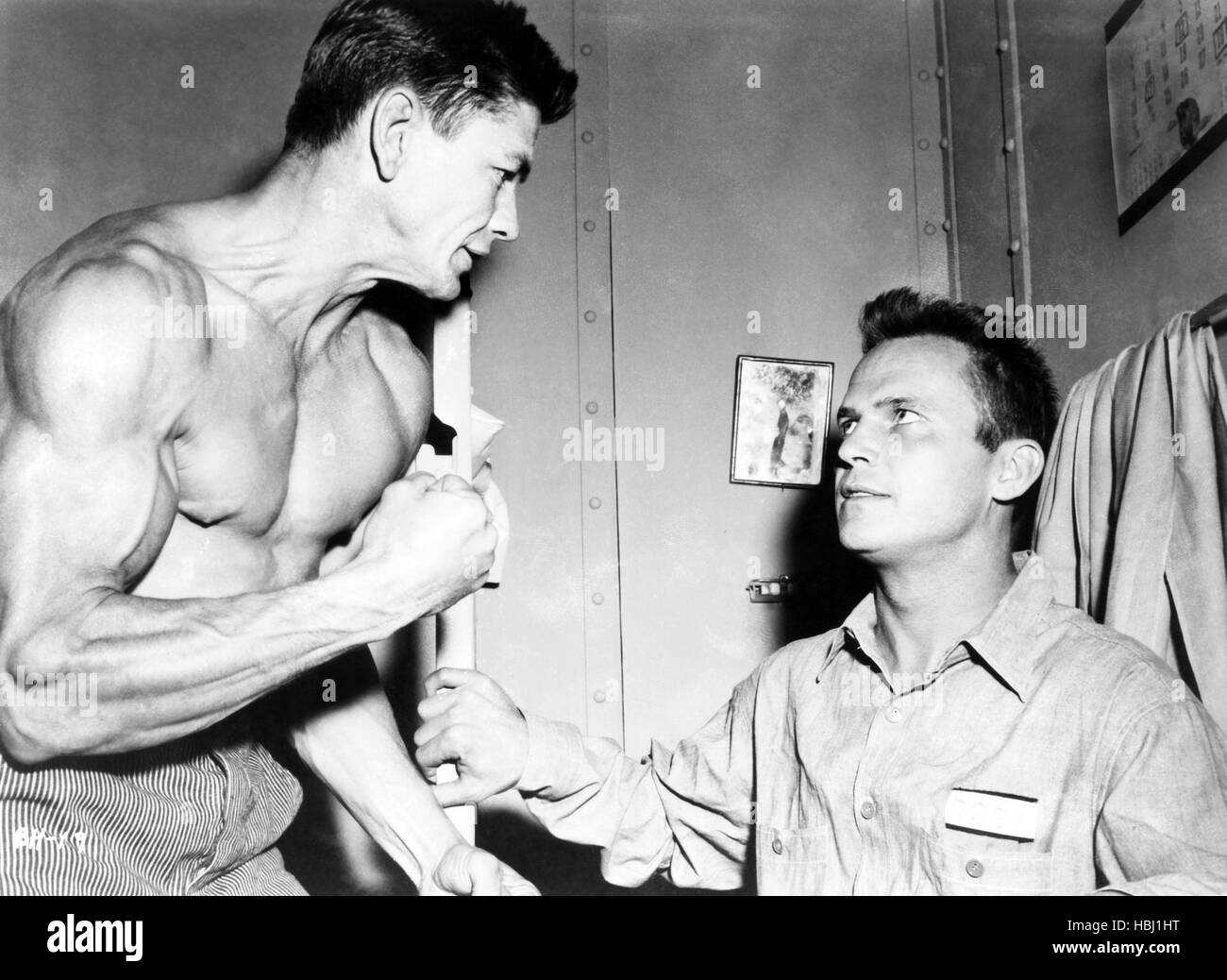 BIG HOUSE, U.S.A., from left: Charles Bronson, Ralph Meeker, 1955 Stock ...