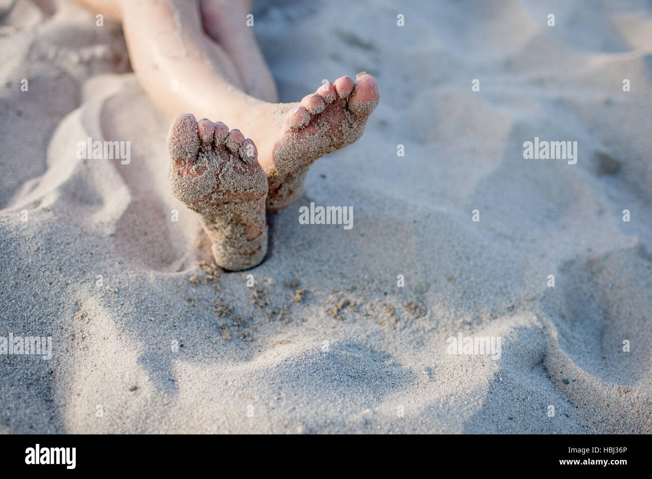 Girls Feet On Sand High Resolution Stock Photography and Images - Alamy