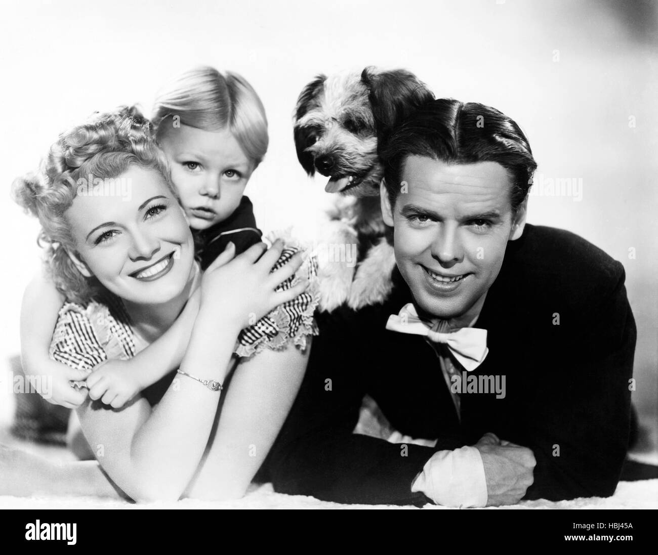 BLONDIE, from left, Penny Singleton, Larry Simms, Daisy the dog, Arthur Lake, 1938 Stock Photo ...