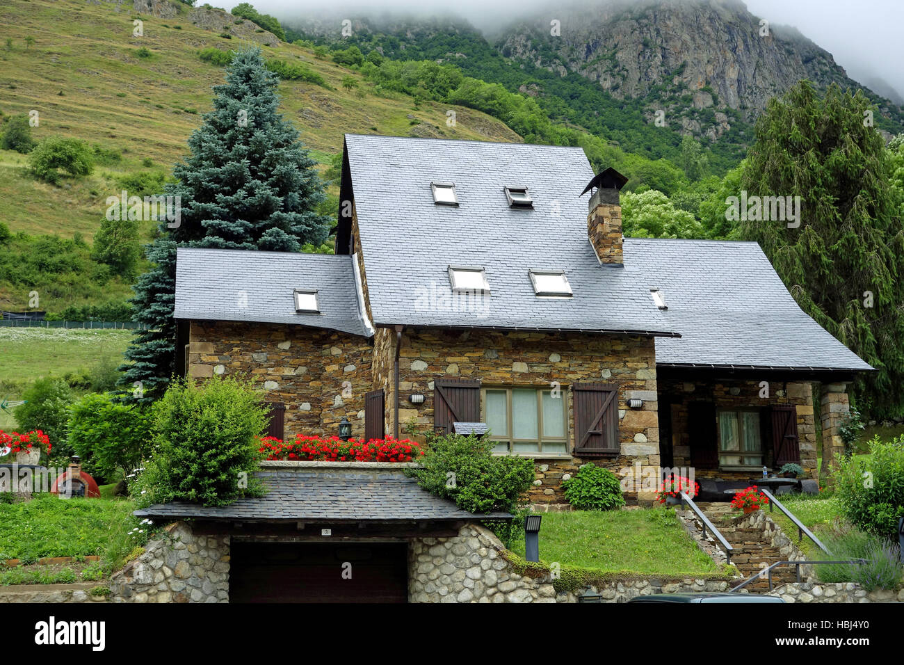 House of quarry stone in the Pyrenees Stock Photo - Alamy