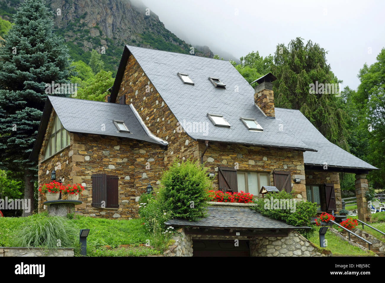 House of quarry stone in the Pyrenees Stock Photo - Alamy