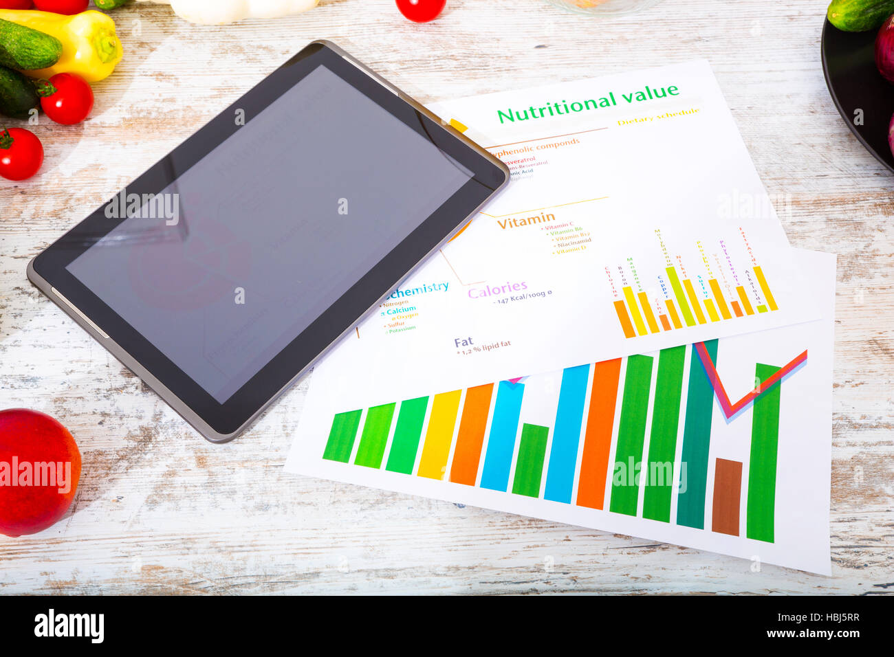 Healthy nutrition and tablet Stock Photo - Alamy