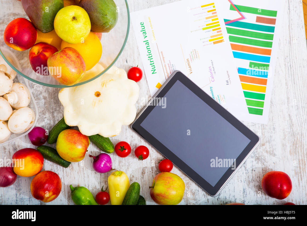 Healthy nutrition and tablet Stock Photo - Alamy