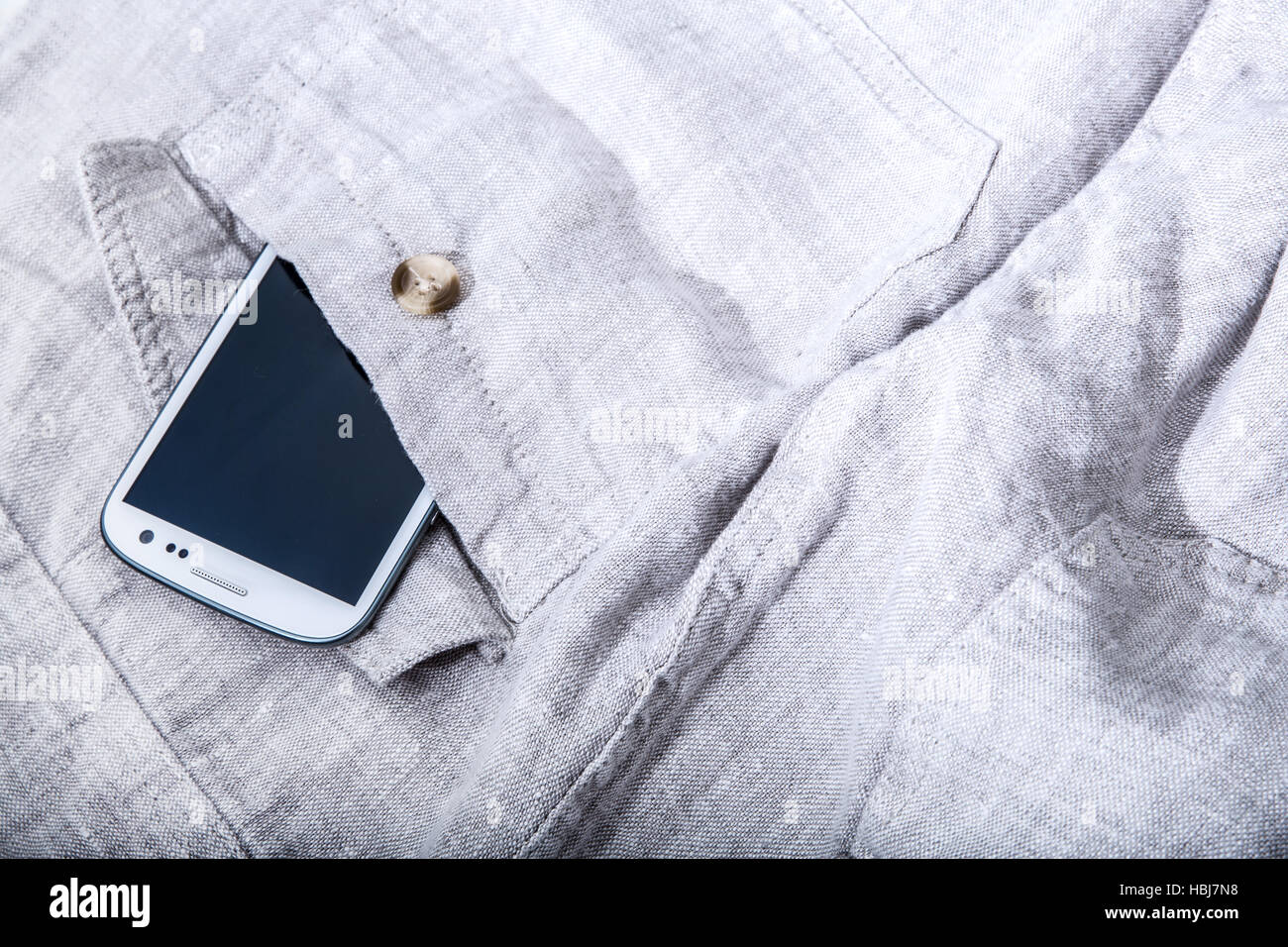 Smartphone in the pocket Stock Photo - Alamy