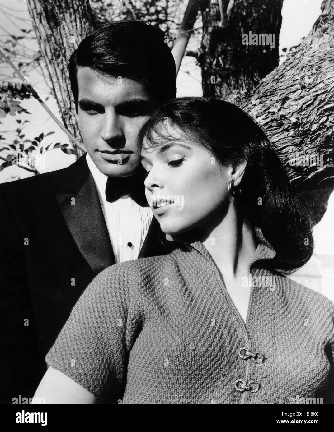 BY LOVE POSSESSED, George Hamilton, Yvonne Craig, 1961 Stock Photo - Alamy