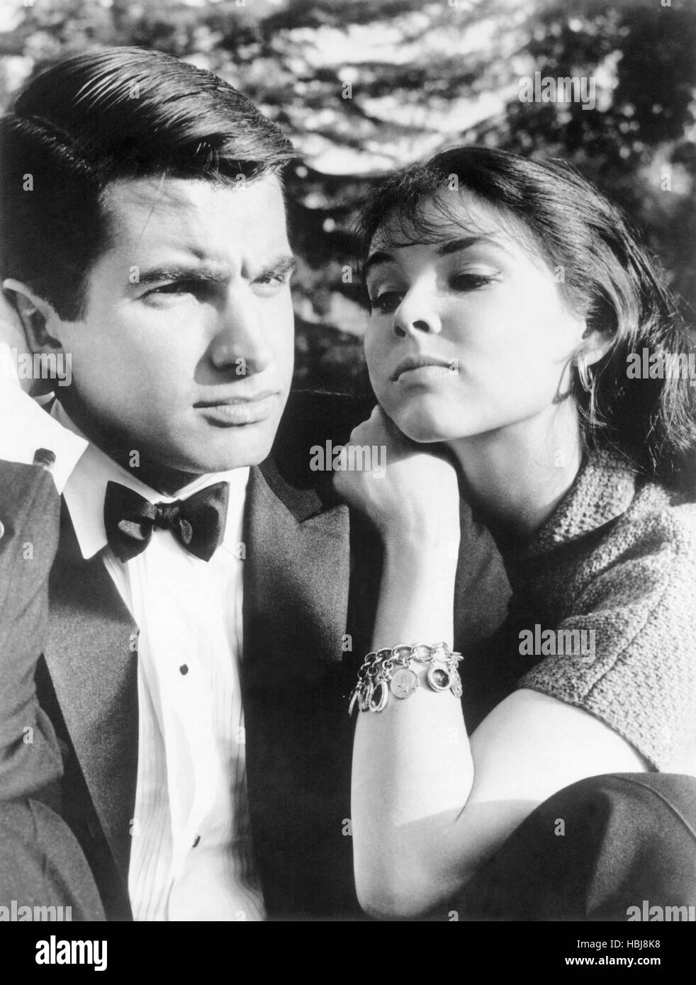 BY LOVE POSSESSED, George Hamilton, Yvonne Craig, 1961 Stock Photo - Alamy