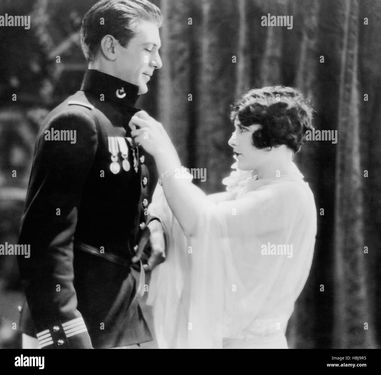 BEAU SABREUR, from left: Gary Cooper, Evelyn Brent, 1928 Stock Photo ...