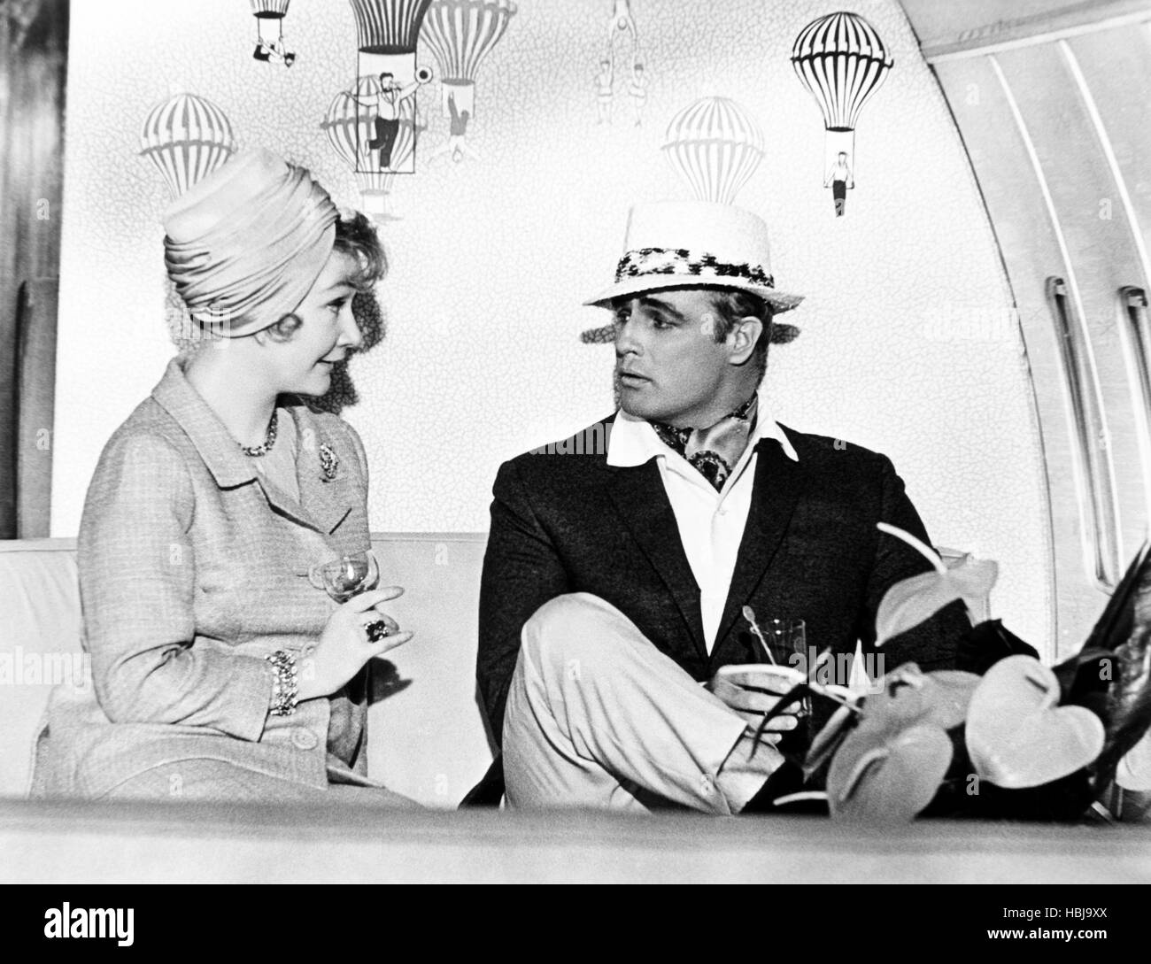 BEDTIME STORY, from left, Dody Goodman, Marlon Brando, 1964 Stock Photo ...