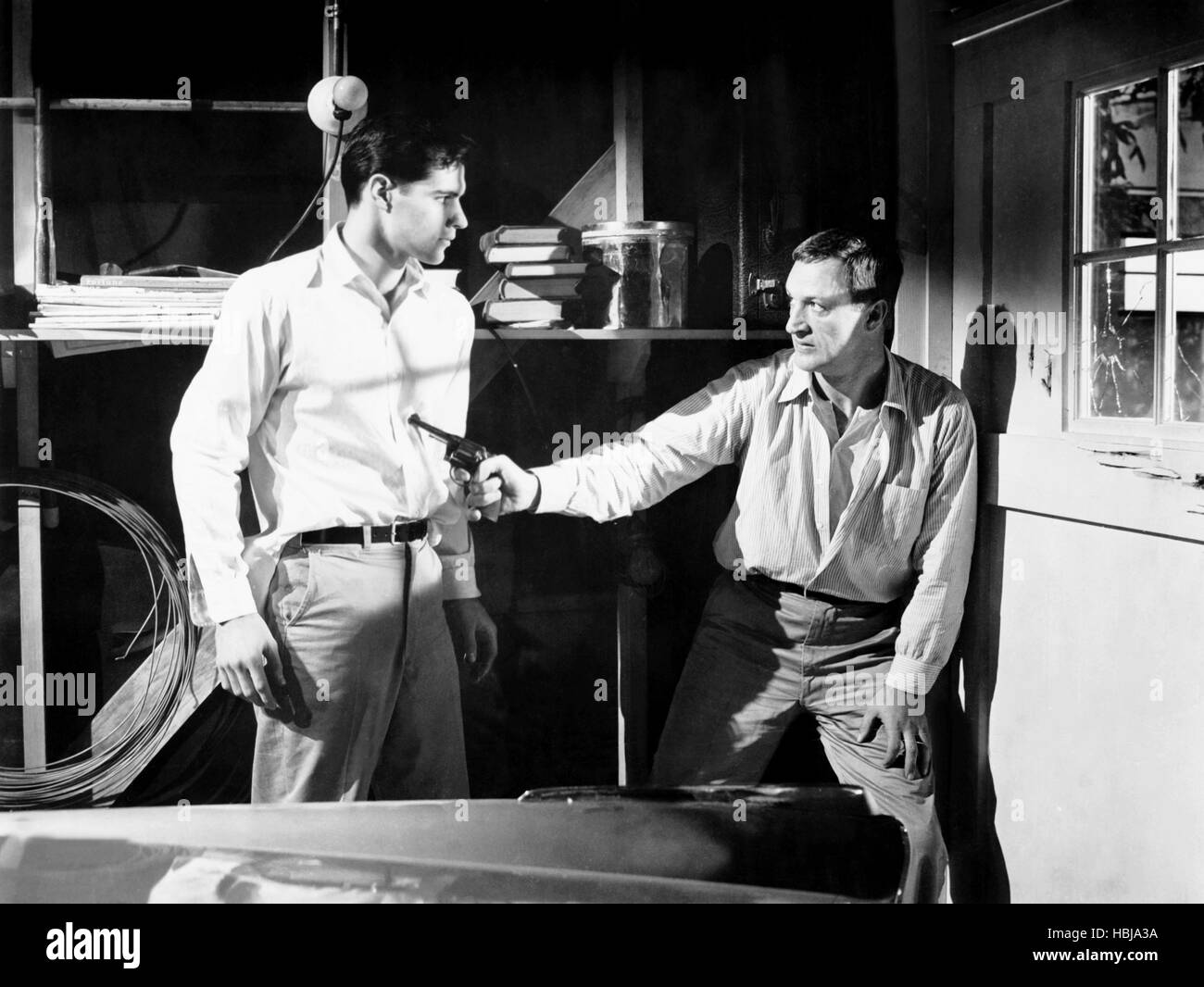 BEHIND THE HIGH WALL, from left, John Gavin, John Larch, 1956 Stock ...