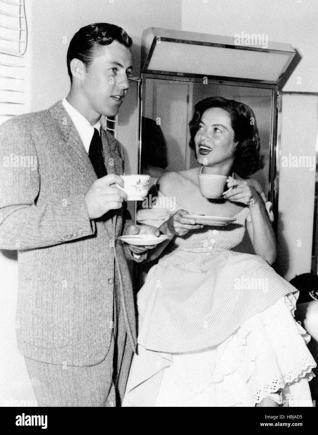 BEYOND THE FOREST, from left, makeup man Bud Westmore, Dona Drake ...