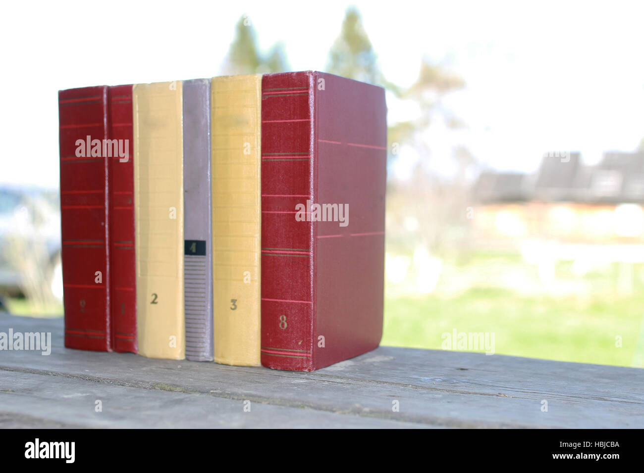 books standing on a table Stock Photo - Alamy