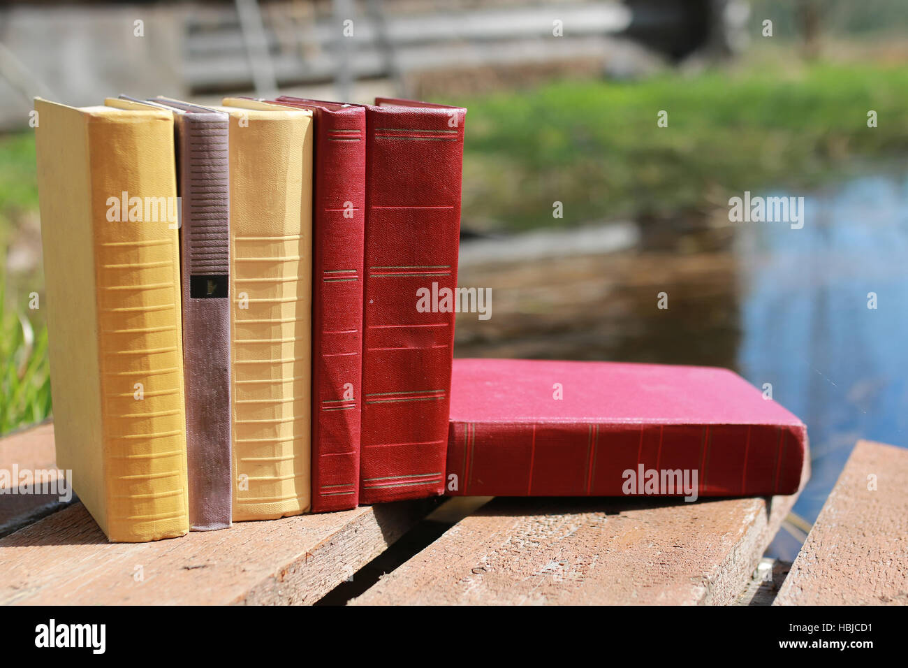 books standing on a table Stock Photo - Alamy
