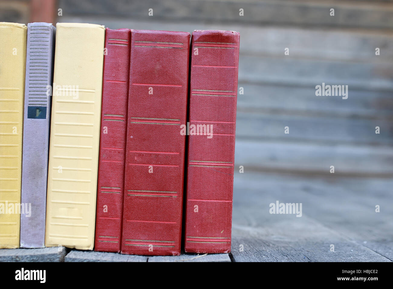 books standing on a table Stock Photo - Alamy
