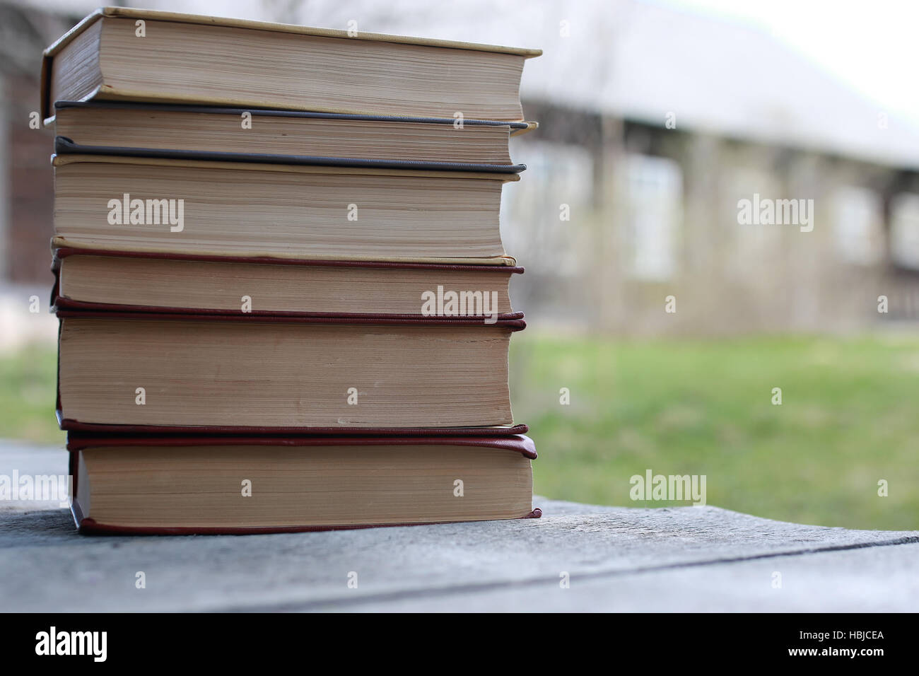 books standing on a table Stock Photo - Alamy