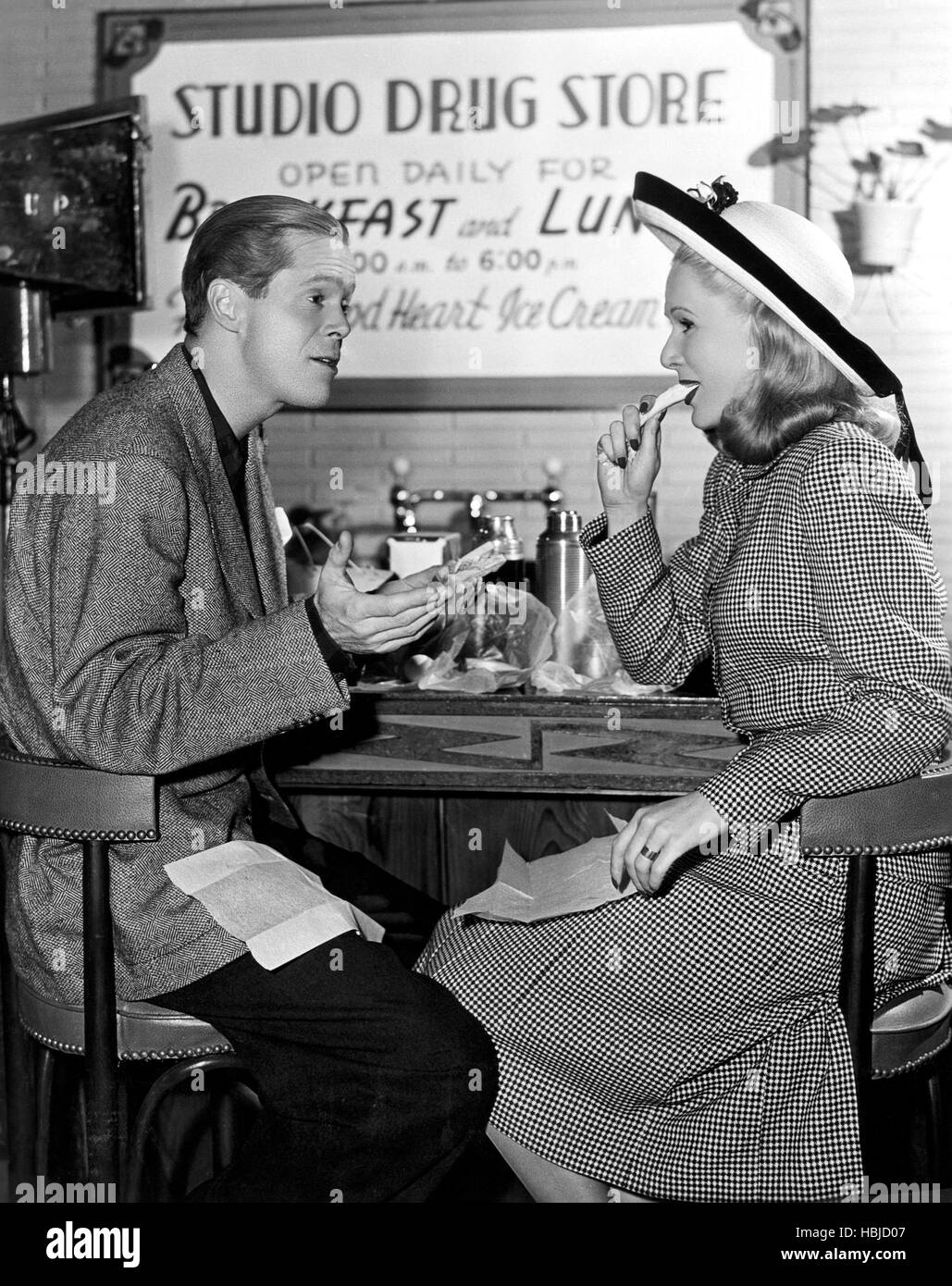 BLACK ANGEL, from left: Dan Duryea, June Vincent eating lunch, on set ...