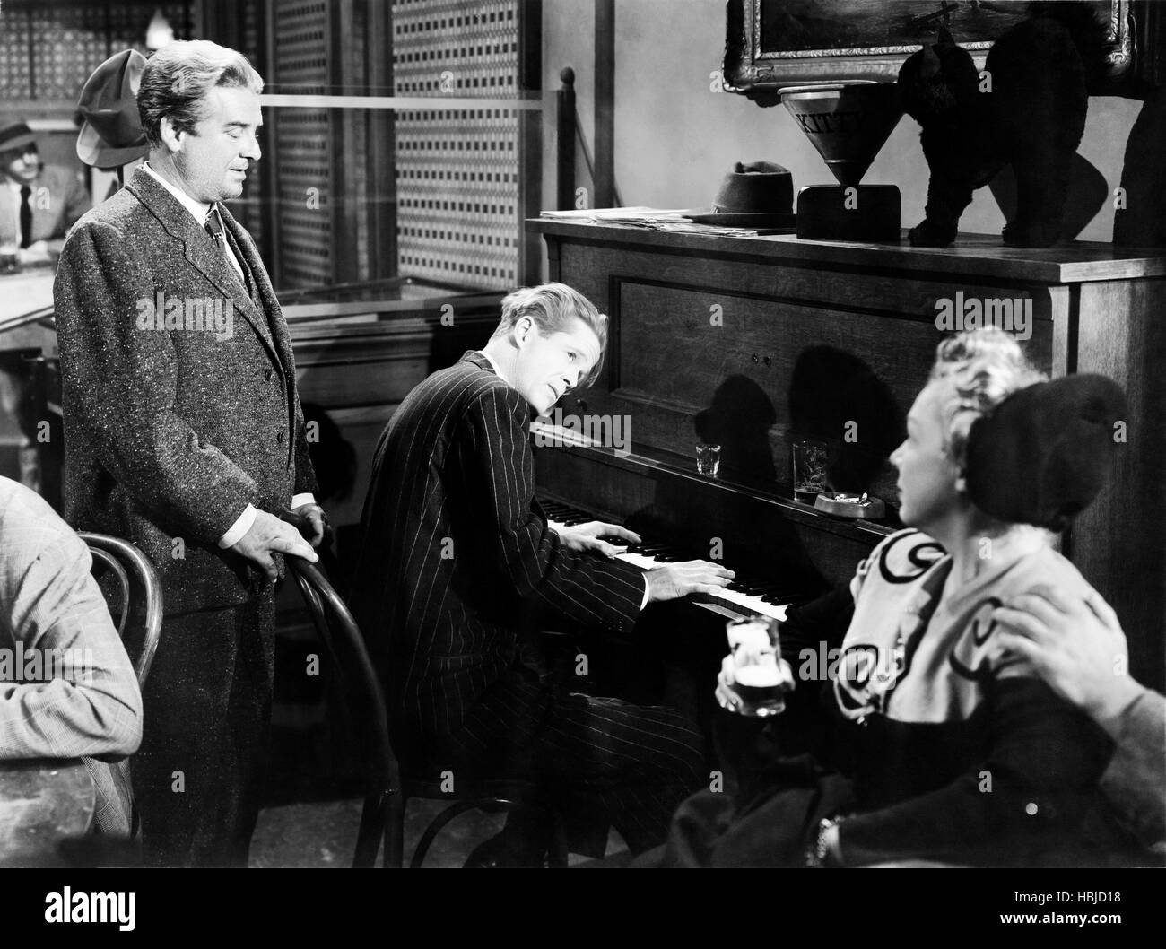BLACK ANGEL, Wallace Ford (standing), Dan Duryea (at piano), 1946 Stock ...