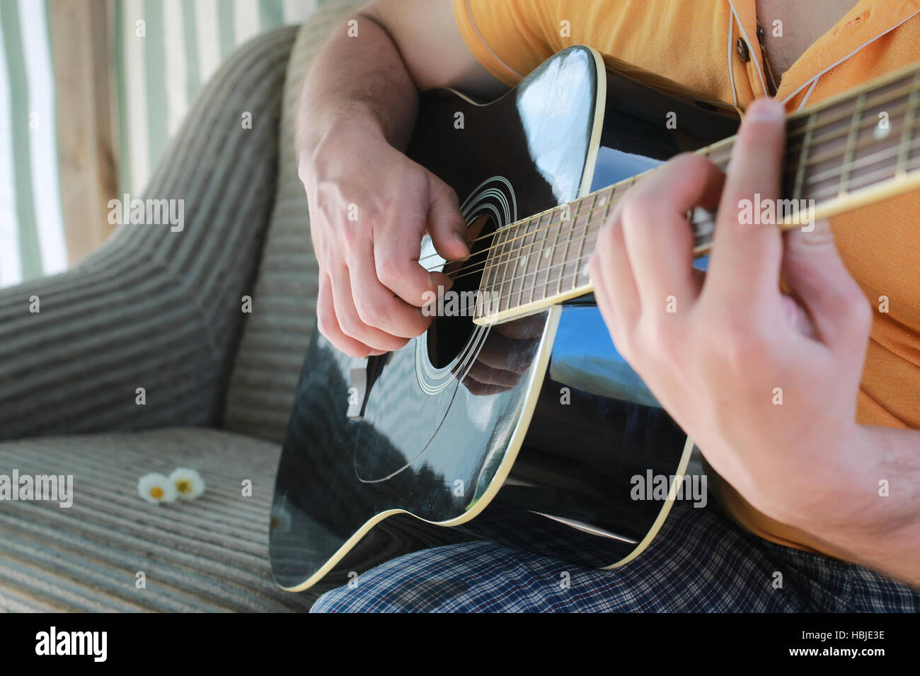 guitar string man hand outdoor Stock Photo - Alamy